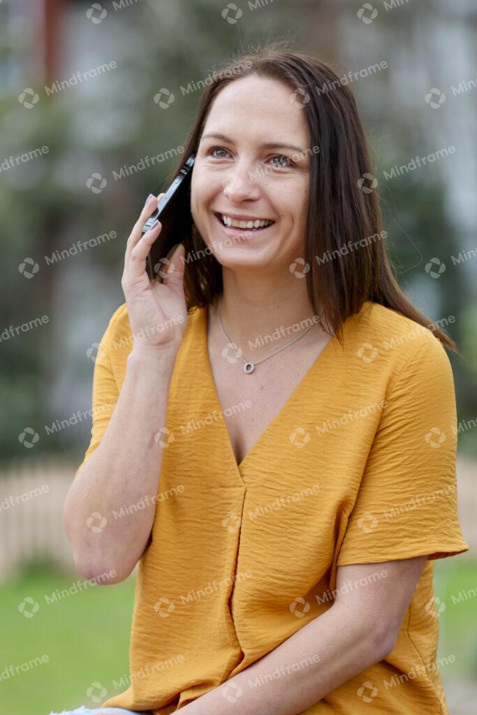One person sitting talking on the phone in park – Mindframe online ...