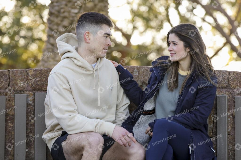 Two people talking and sitting on bench in park – Mindframe online ...